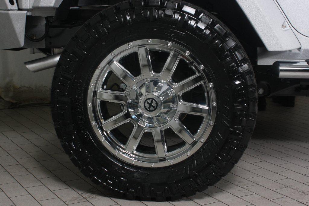 The White Chrome and Rhino Custom Jeep Wrangler by Eastchester Customs