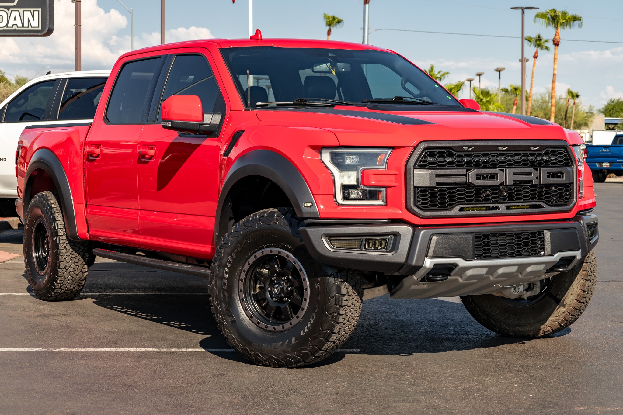 Ford F150 Raptor Lifted Red