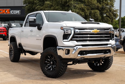 Jacked Up White Chevy Trucks
