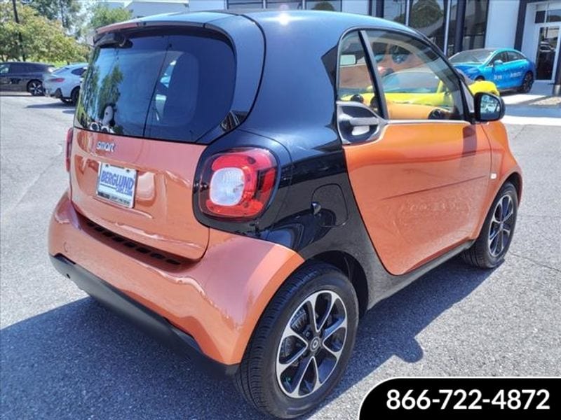 Orange And Blue Smart Car