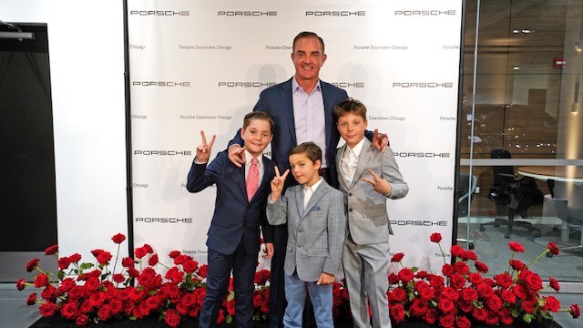Eddie Napleton with family at Porsche Grand Opening